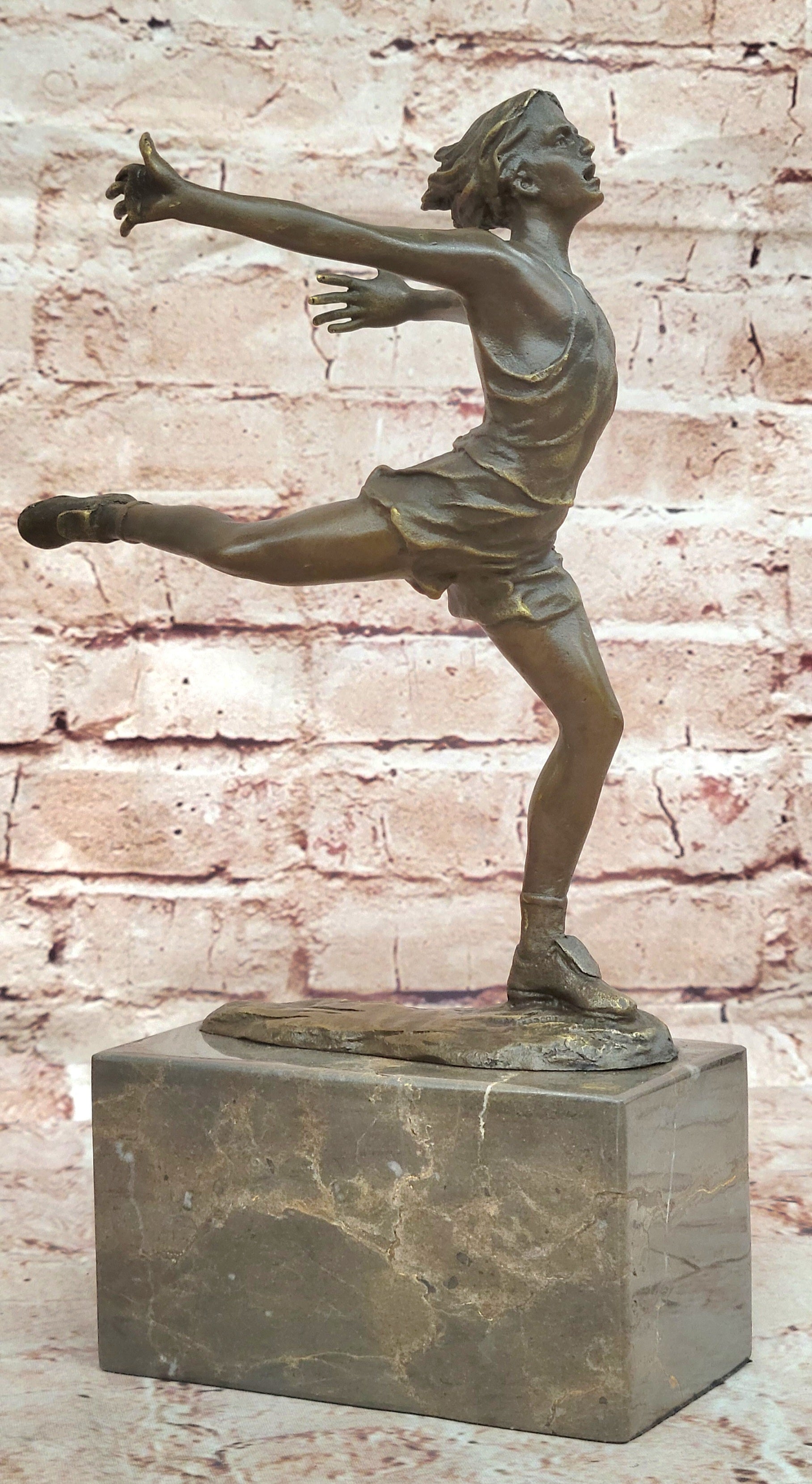 Bronze sculpture of a track and field runner in the starting Original